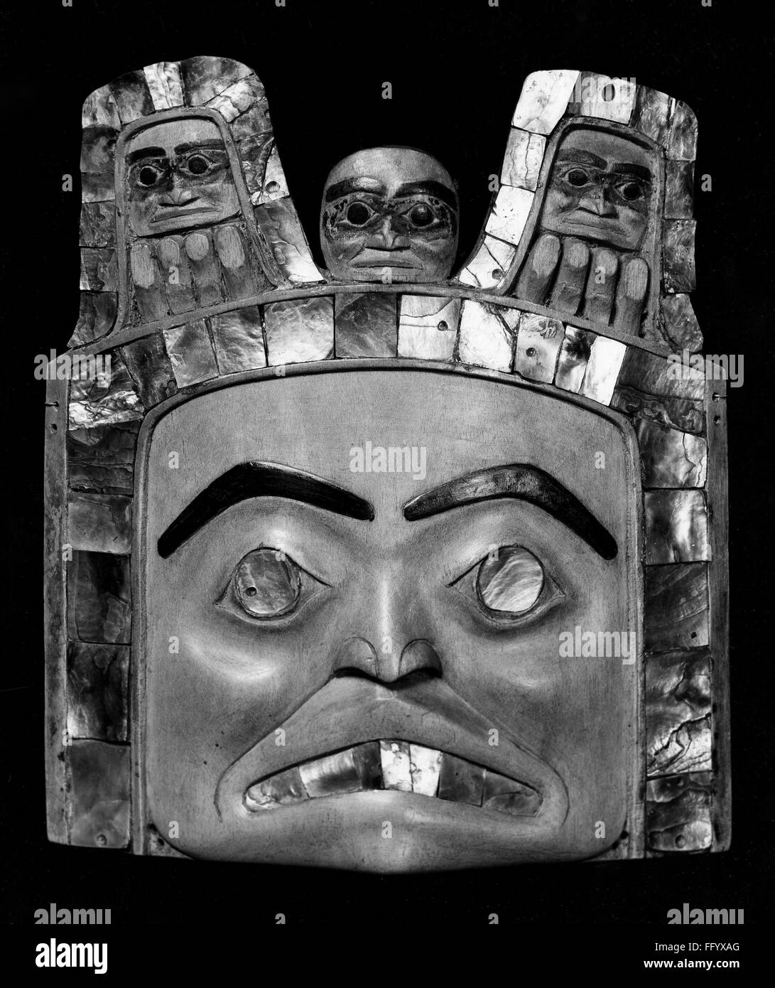 NATIVE AMERICAN FRONTLET. /nCarved and painted wooden frontlet with ...