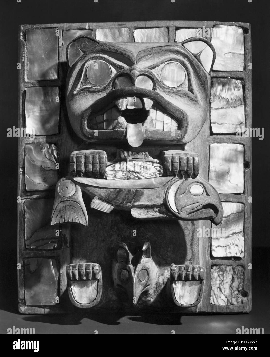 NATIVE AMERICAN FRONTLET. /nCarved and painted wooden frontlet with ...