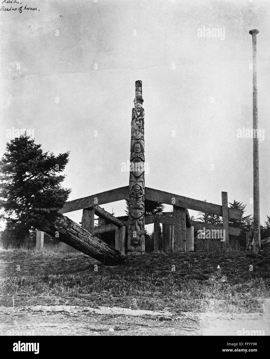 CANADA: HAIDA TOTEM POLE. /nTotem pole topped by a figure in a tall hat ...