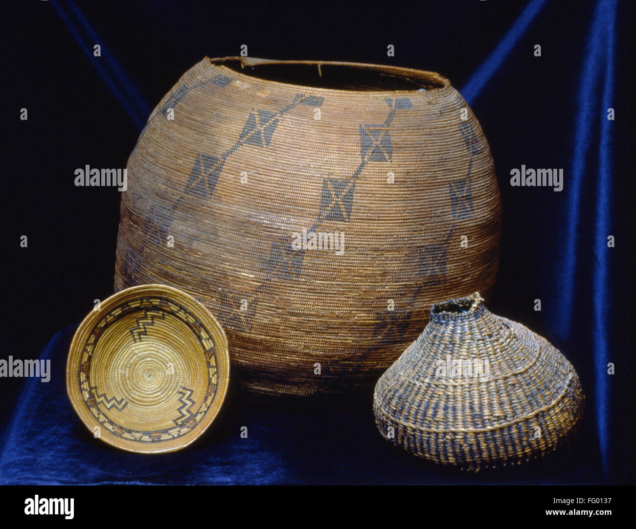 NATIVE AMERICAN BASKETS. /nWoven baskets and water bottle of the ...