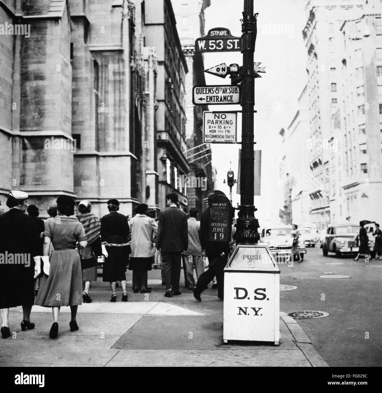 NEW YORK CITY, c1954. /nStreet signs on the corner of 5th Avenue and ...