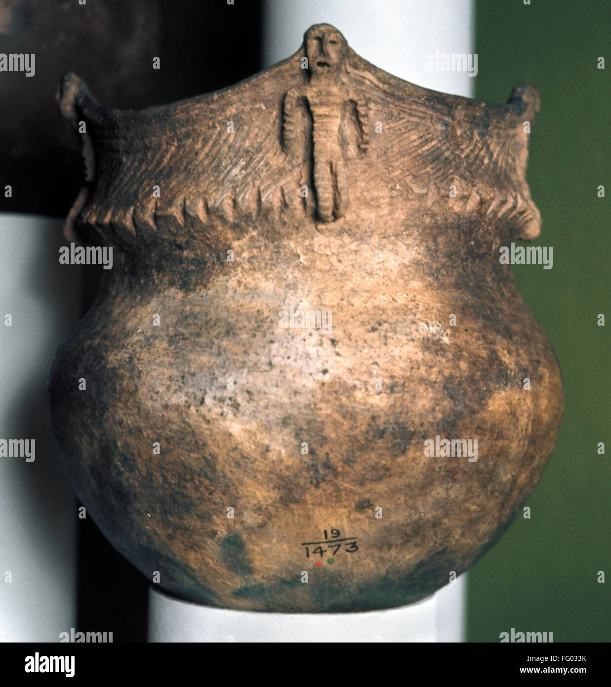 NATIVE AMERICAN POT. /nClay cooking pot with incisions and human ...