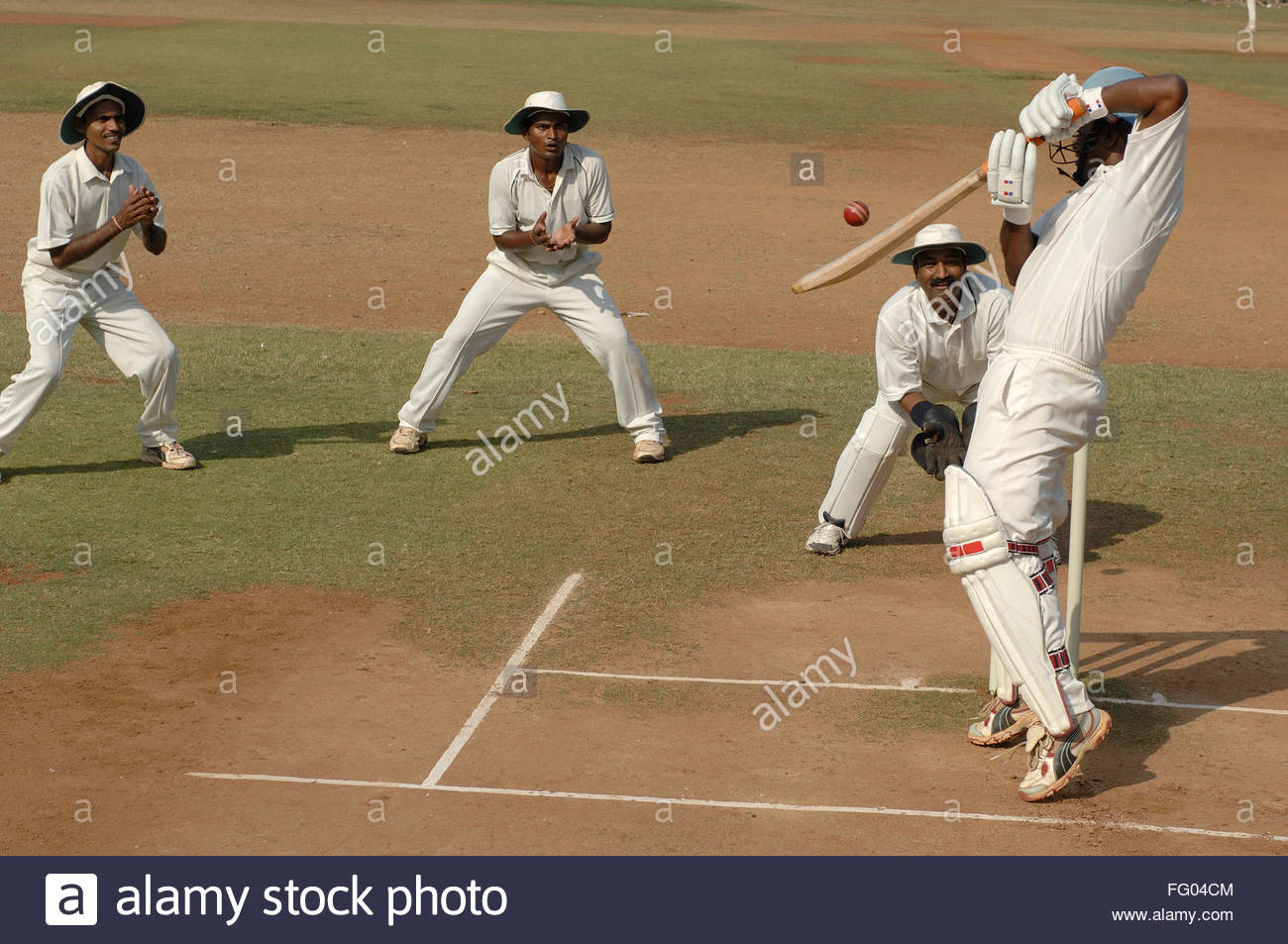 Cricketer Ball Fielder Stock Photos & Cricketer Ball Fielder Stock ...