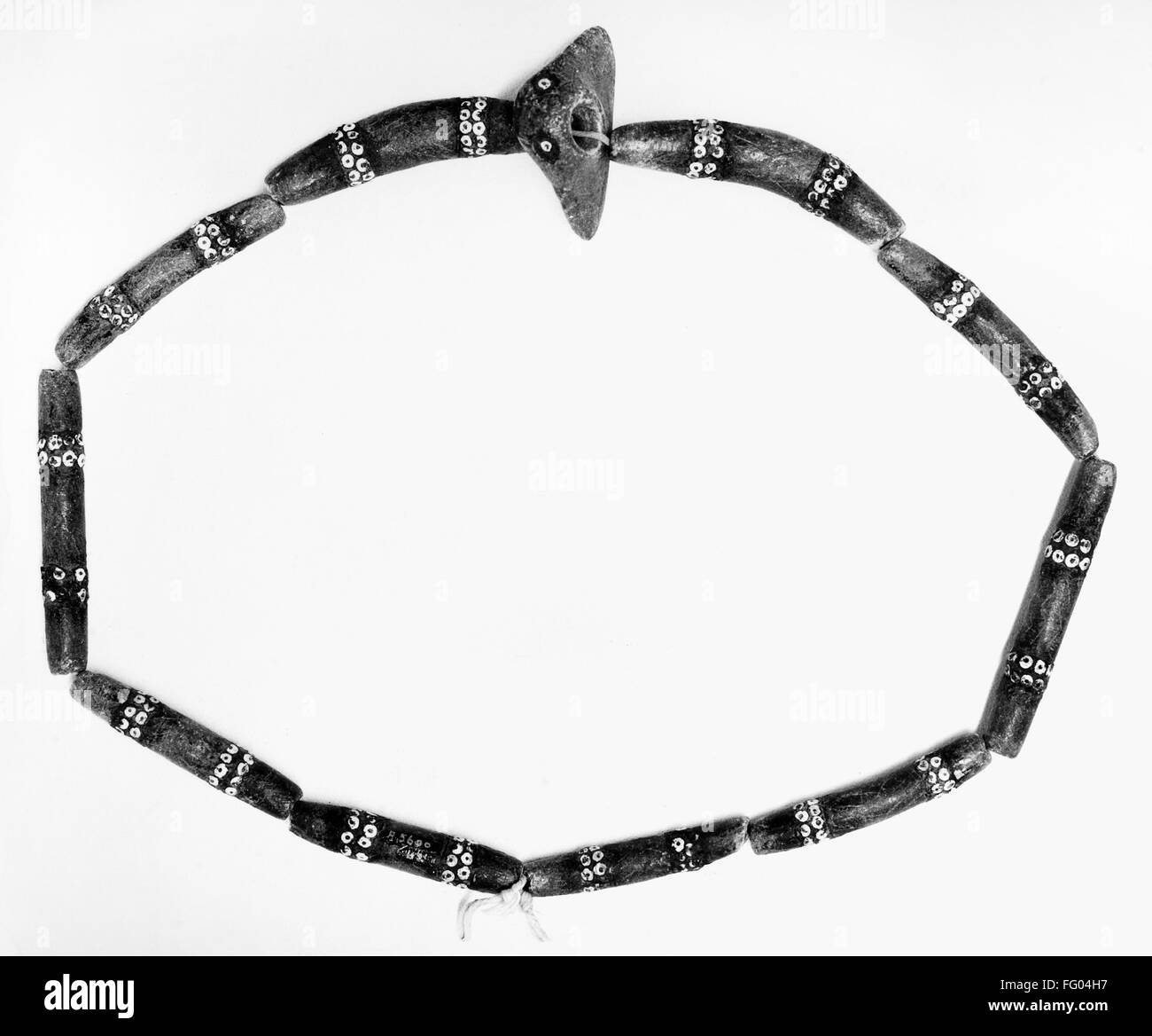 NATIVE AMERICAN NECKLACE. /nString of tubular stone beads with bat ray ...