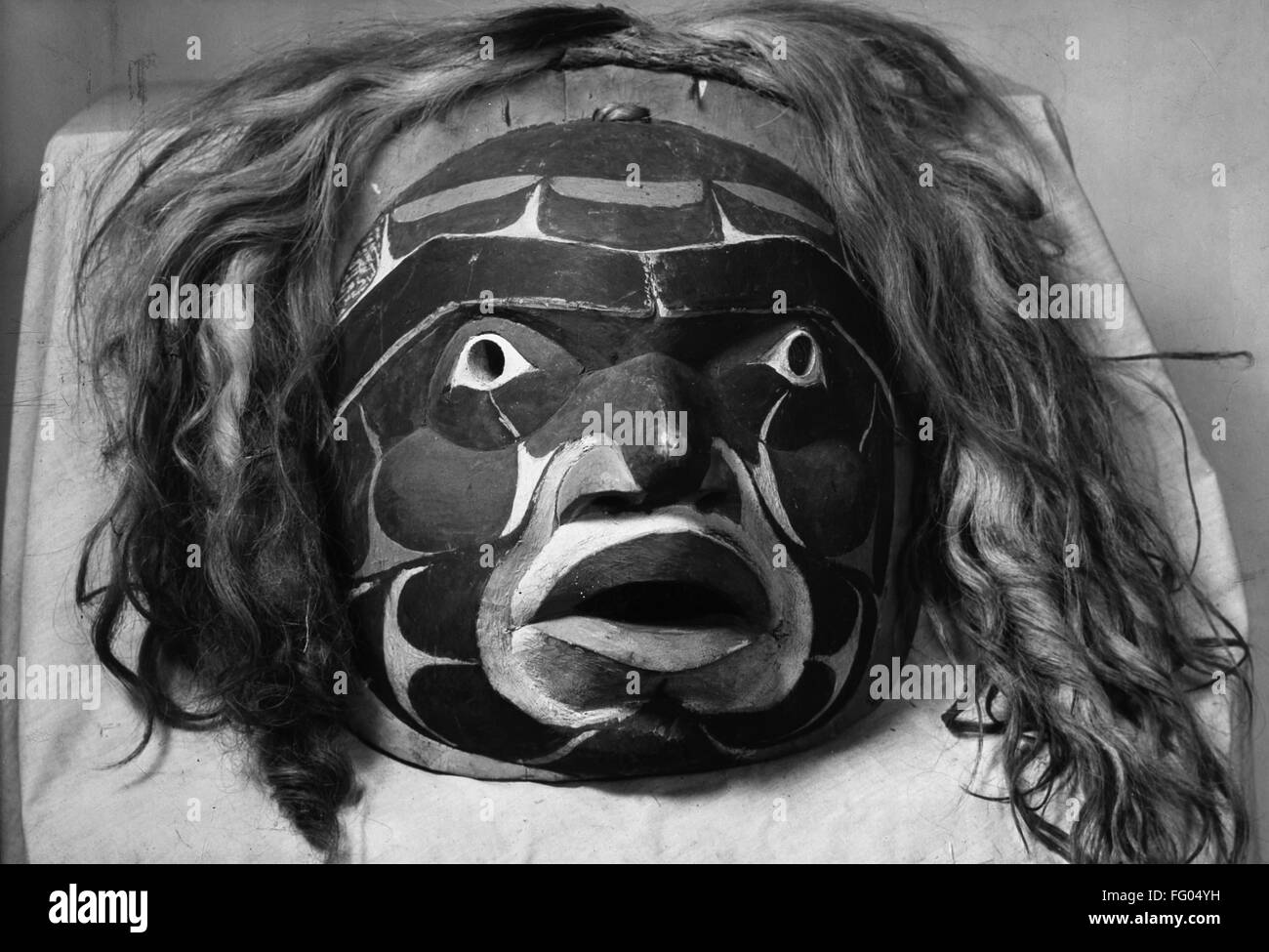 KWAKIUTL MASK. /nPainted wooden mask representing Tsonoqua, the Wild ...