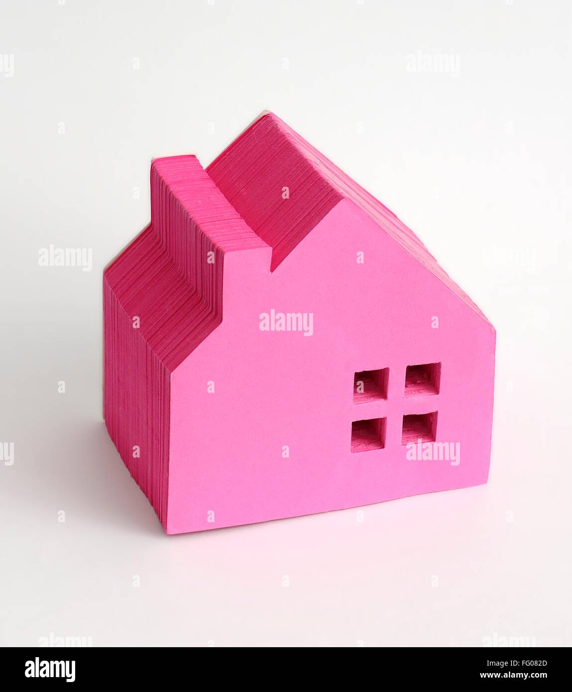 Pink post it notes in the shape of a house Stock Photo - Alamy