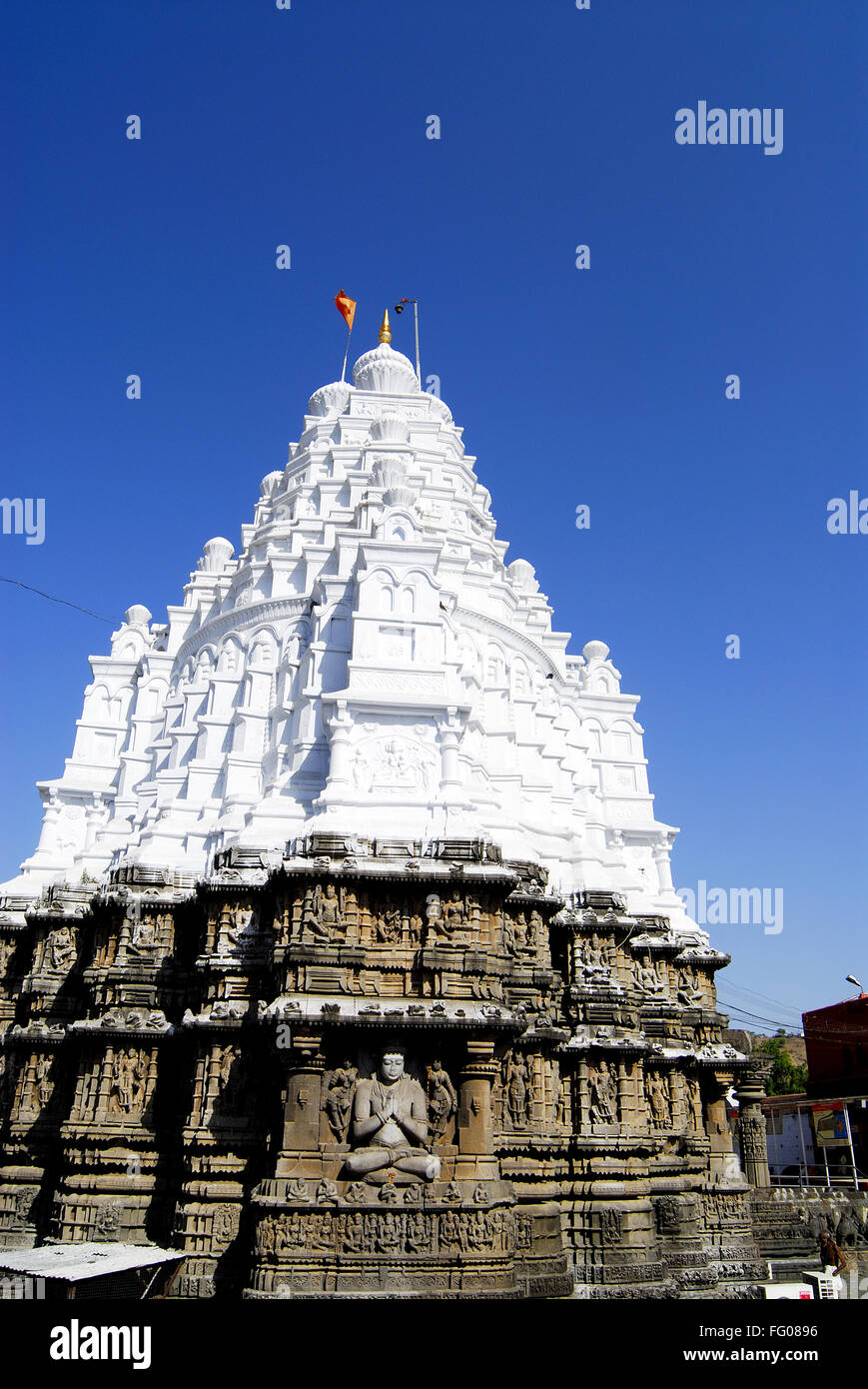 Old priest cleaning God Vishnu Statue temple Aundhanagnath twelve ...