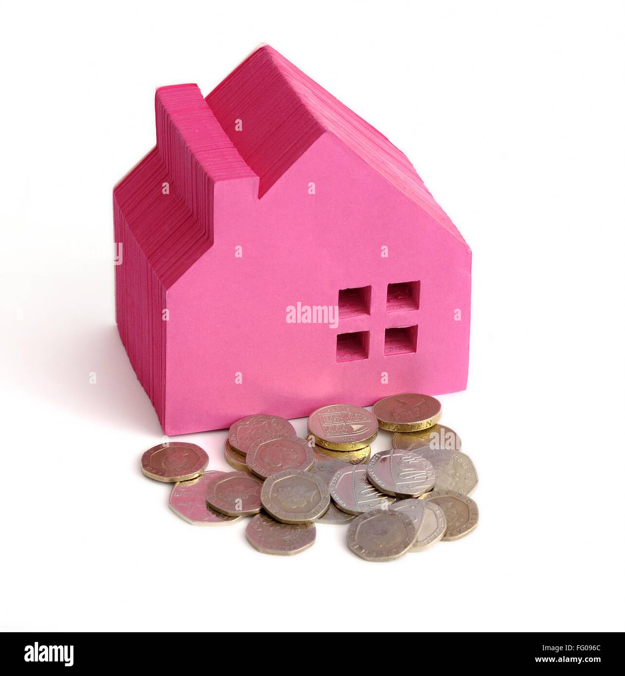 Pink post it notes in the shape of a house with coins Stock Photo - Alamy