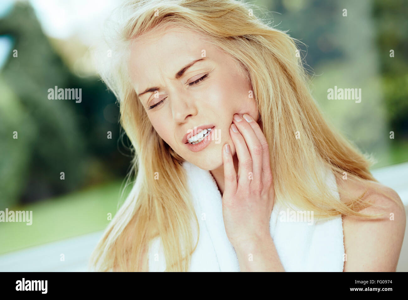 Girl with toothache Stock Photo - Alamy