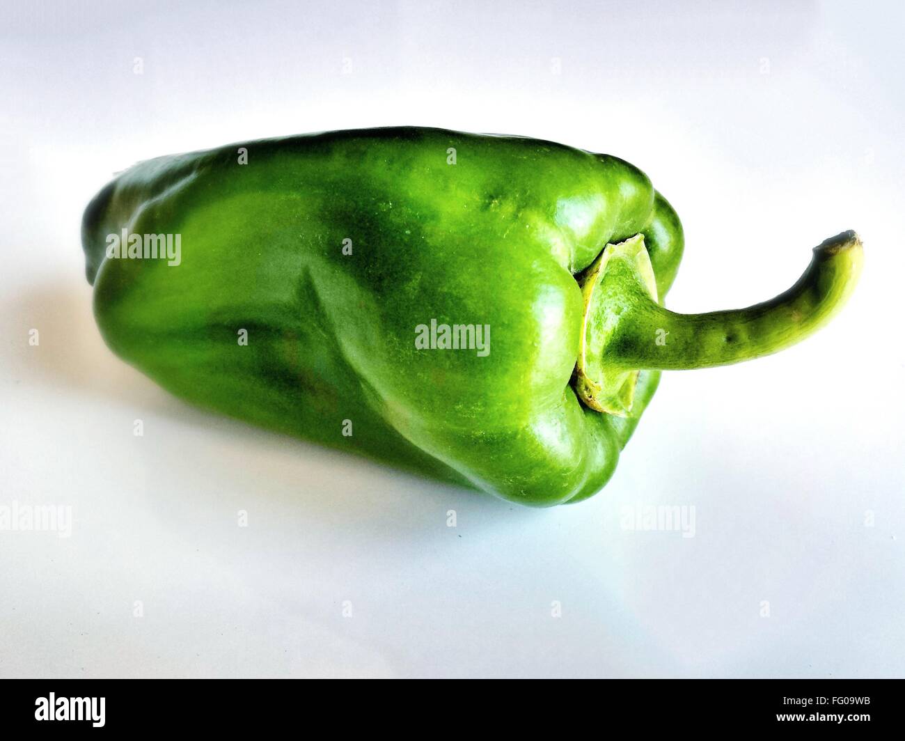 Close-Up Of Green Bell Pepper Against White Background Stock Photo - Alamy