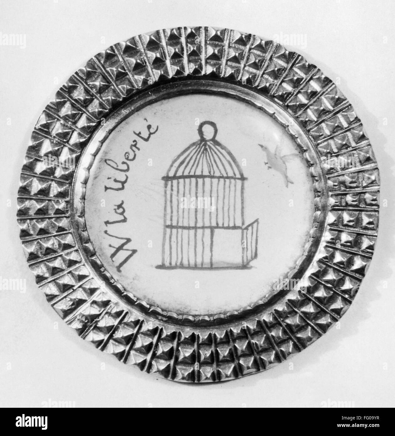 FRENCH REVOLUTION: BUTTON. /nA glass-covered button of sheet iron ...