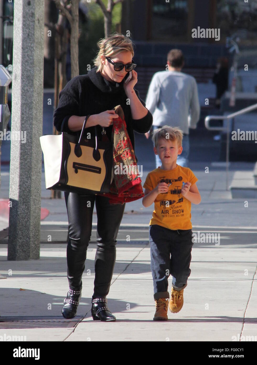 Hilary Duff out with her son, Luca, on a sunny day in Beverly Hills ...