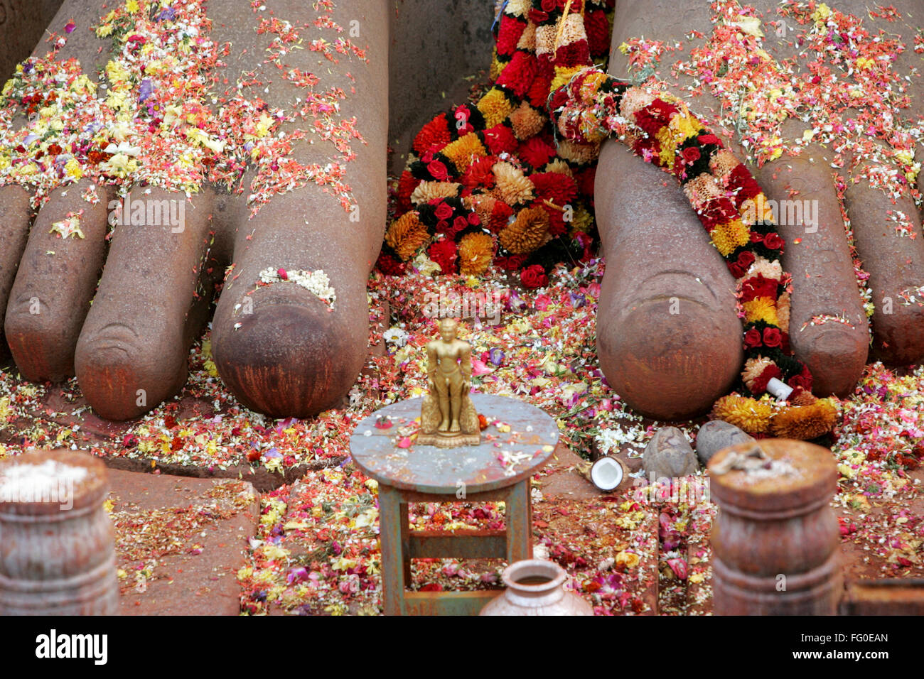 Flowers garlands feet statue bhagwan saint gomateshwara bahubali ...