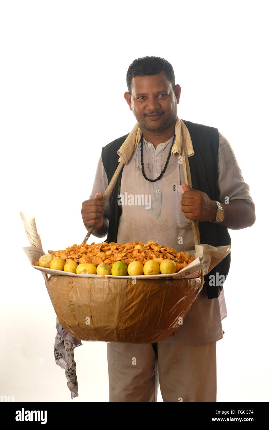 Chana chor garam vendor carrying bucket around neck MR#694Y Stock Photo ...