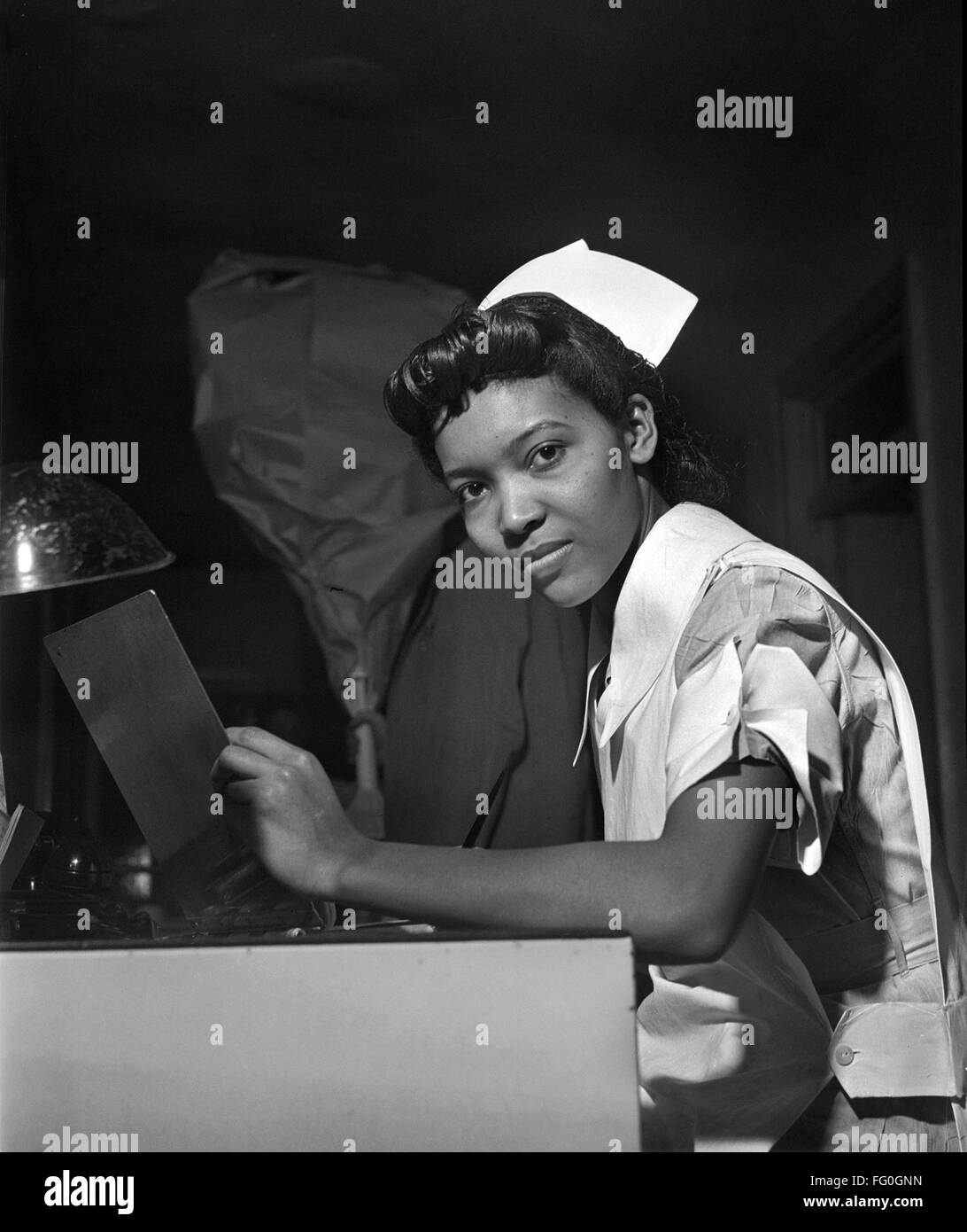 NURSE, 1942. /nStudent nurse Lydia Monroe at Provident Hospital in ...