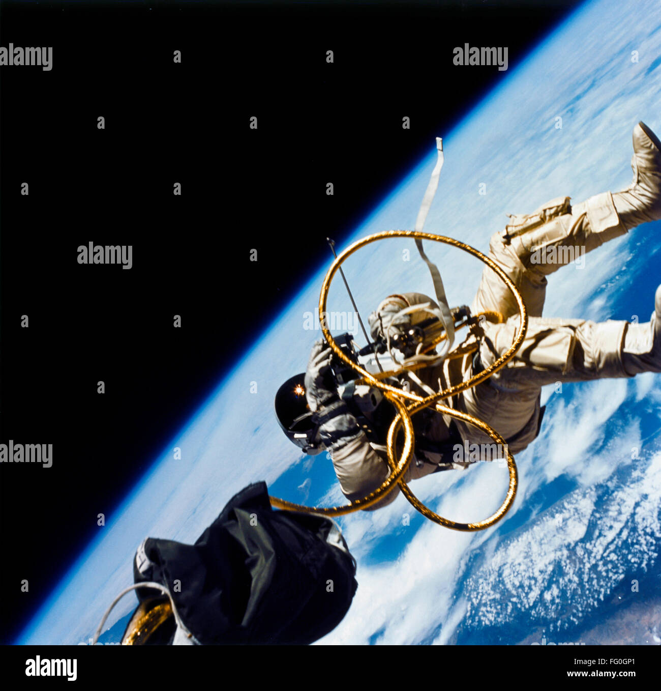 GEMINI 4: SPACEWALK, 1965. /nAstronaut Edward H. White performing a ...