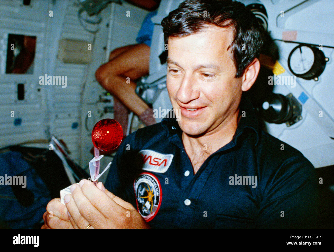 TERRY HART (1946- ). /nAmerican astronaut. With a ball of strawberry ...