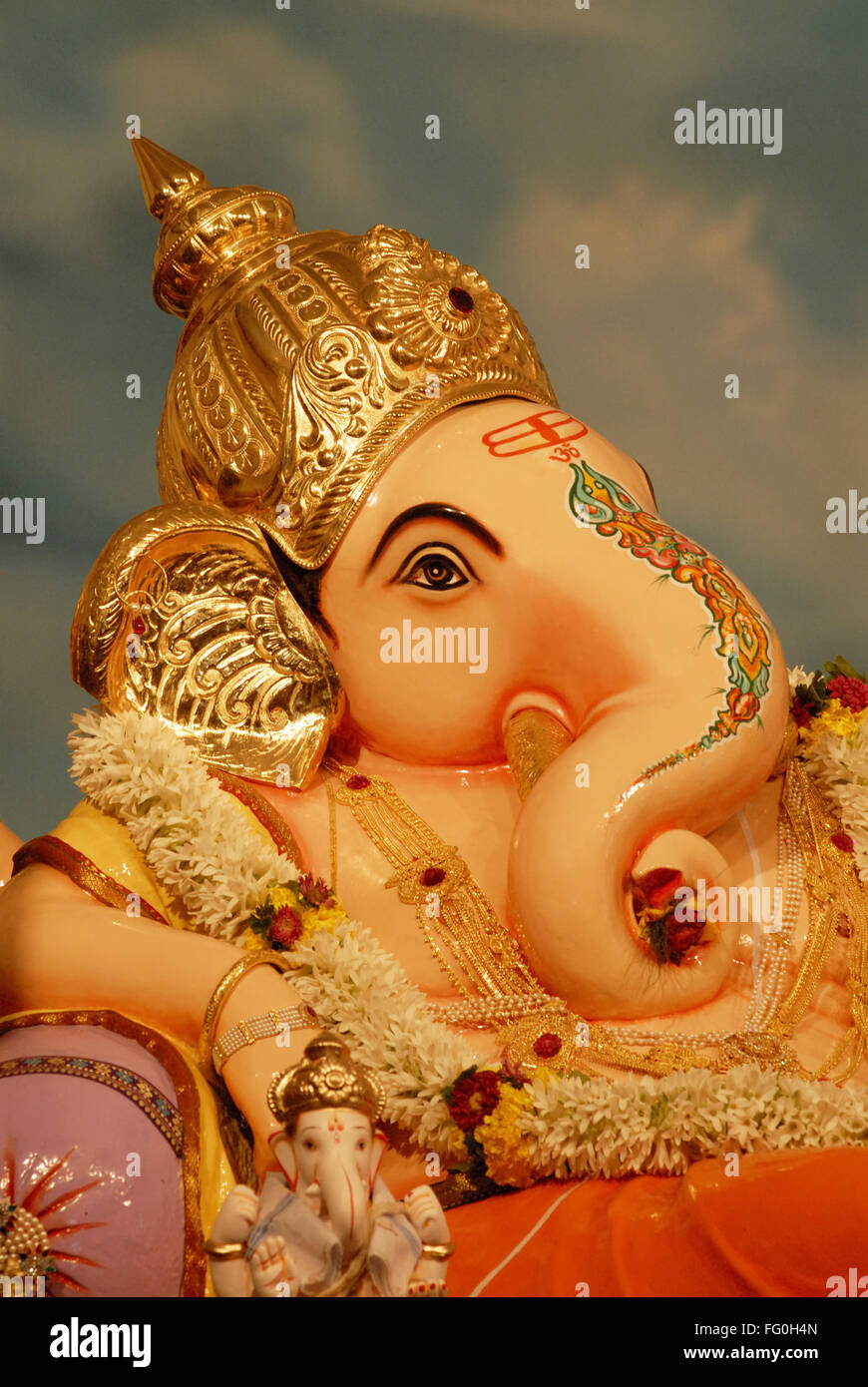 Close up of side view of Idol of Lord Ganesh elephant Headed worshiping ...