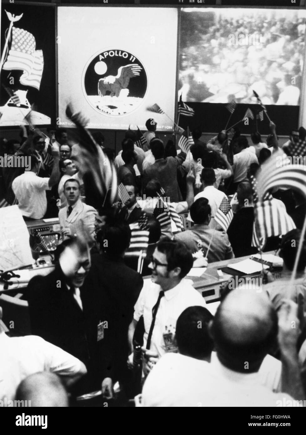 APOLLO 11, 1969. /nFlight controllers in the Mission Control Center at ...