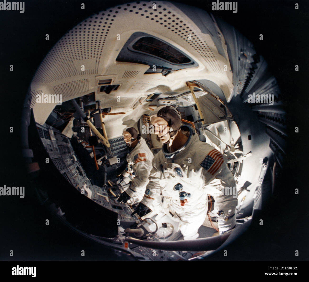 APOLLO 9, 1969. /nFish-eye view of astronauts James McDivitt and ...