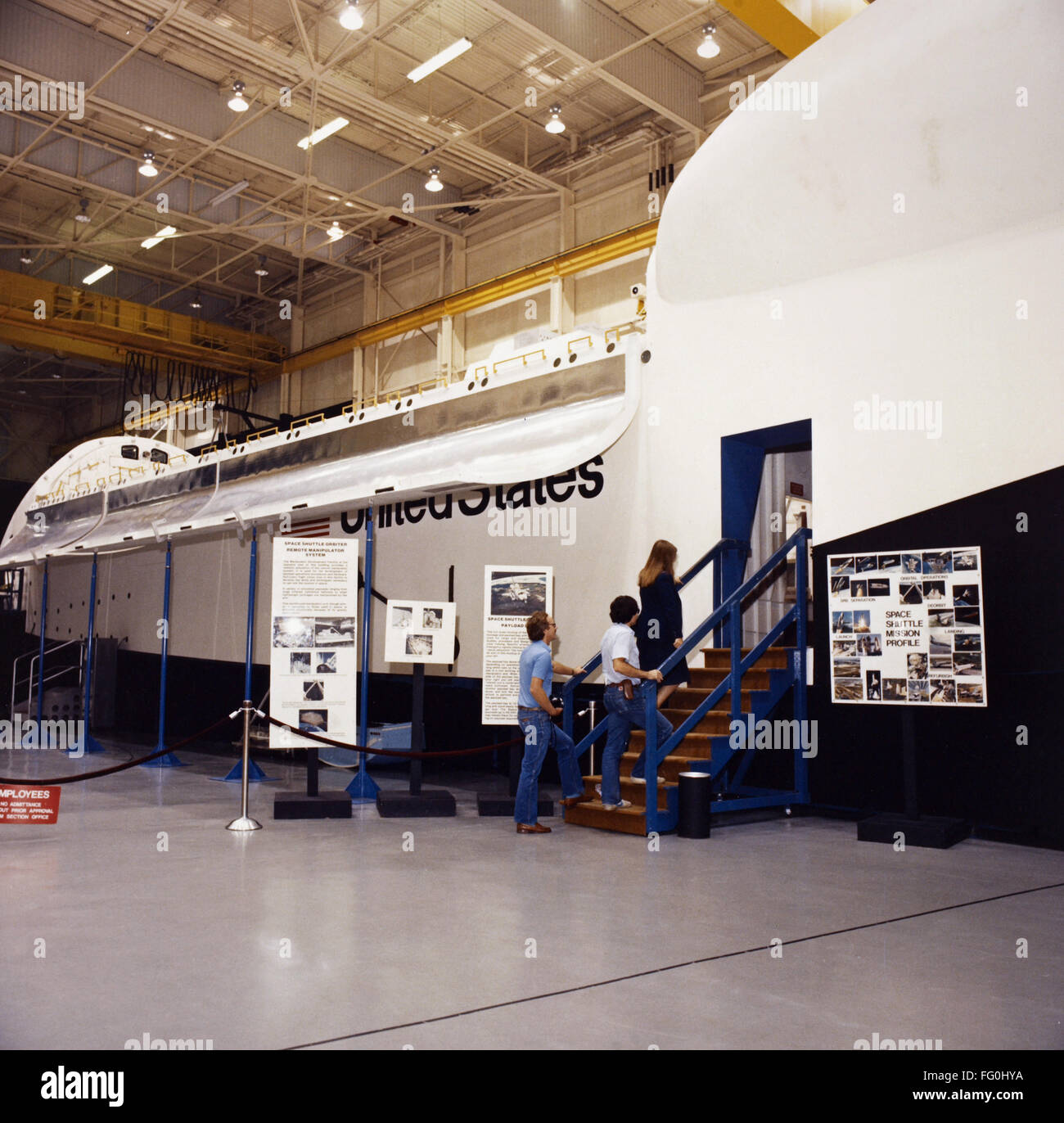 JOHNSON SPACE CENTER, 1983. /nTourists viewing the full-scale model ...