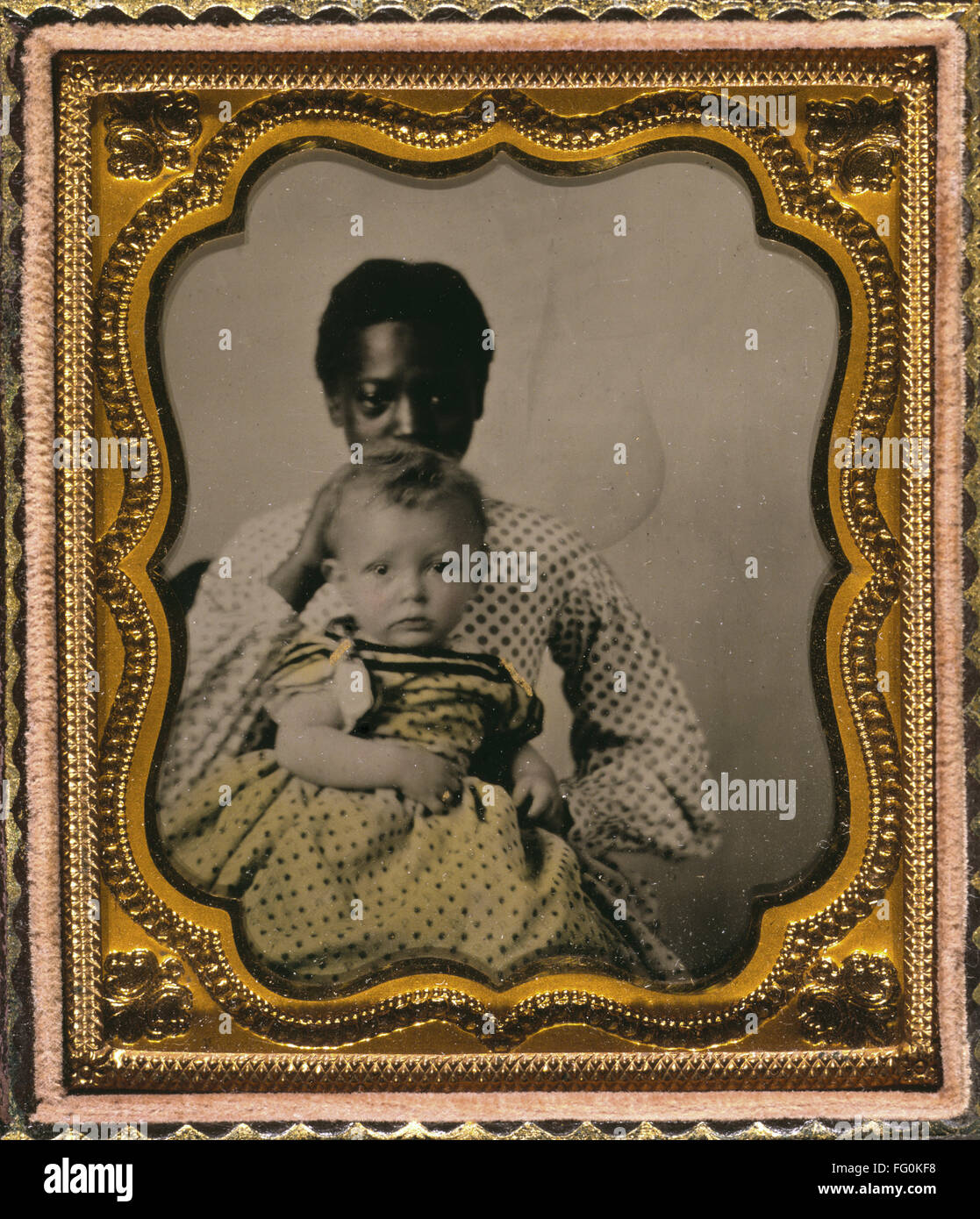 NANNY AND CHILD, c1855. /nA slave woman holding a white child. Hand ...