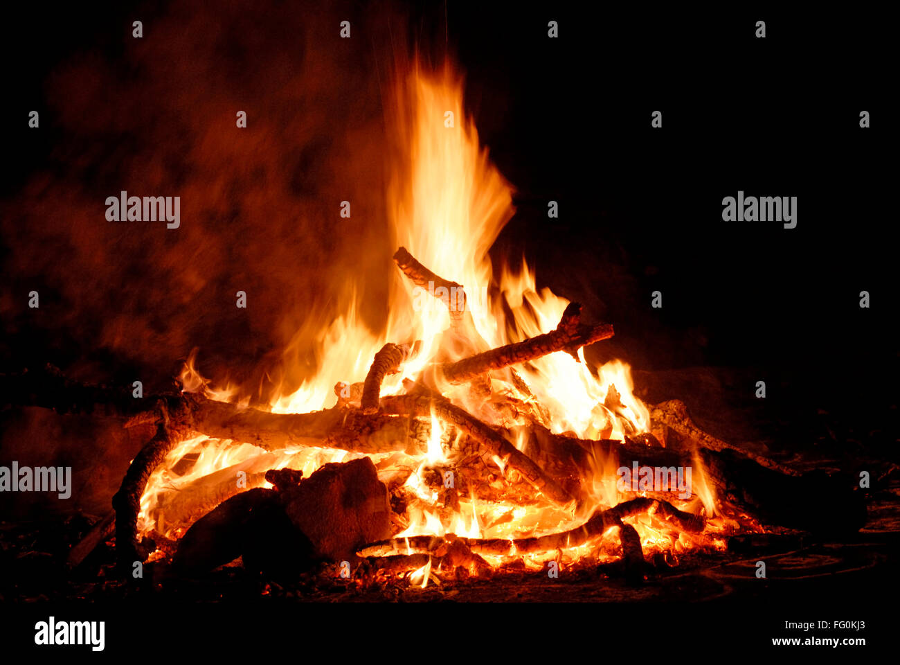 Huge bonfire burning wood fire ignited to celebrate Holi festival ...