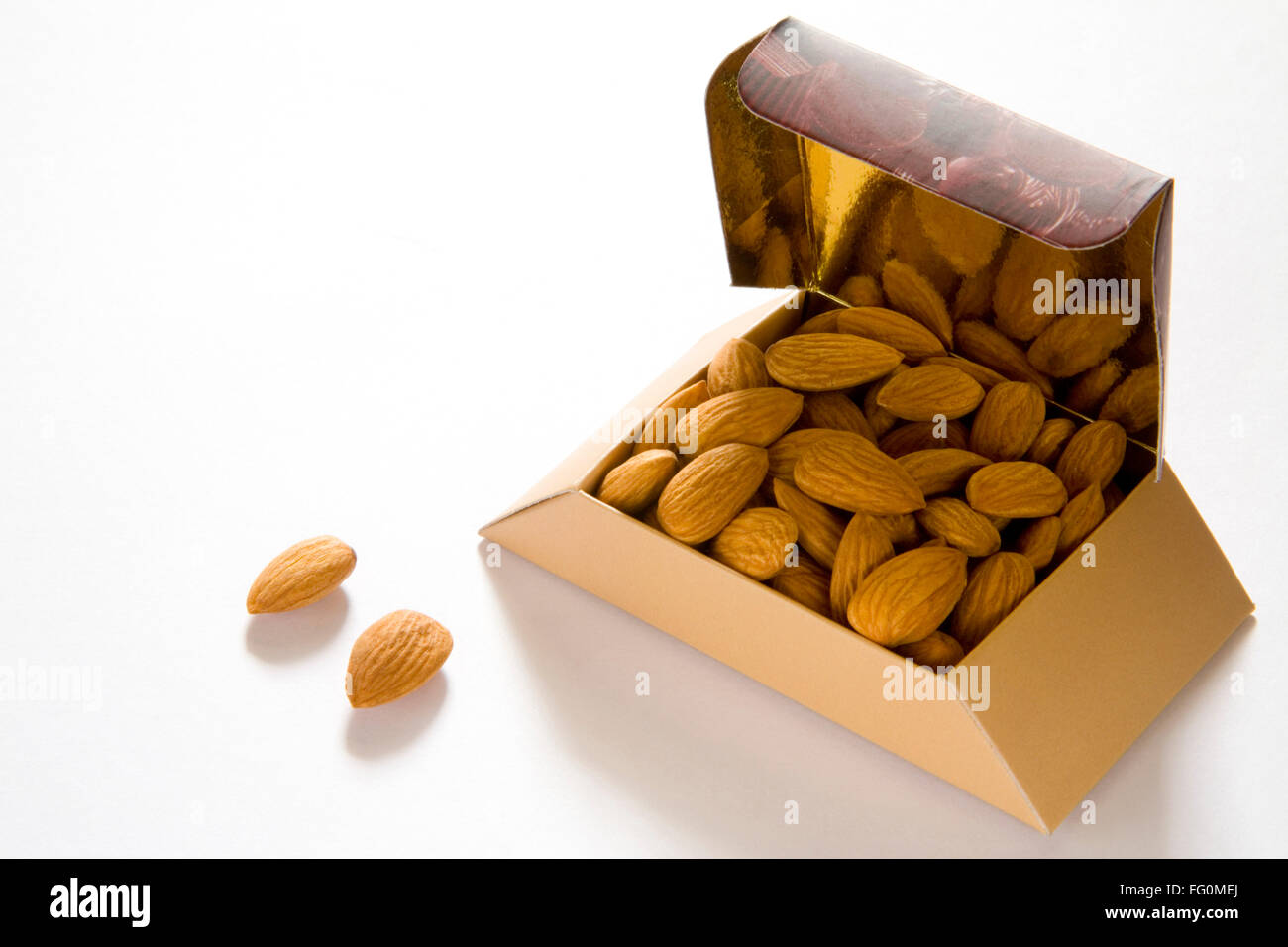 Dry fruit , whole Almonds nuts Badam Prunus dulcis in gift box Stock ...