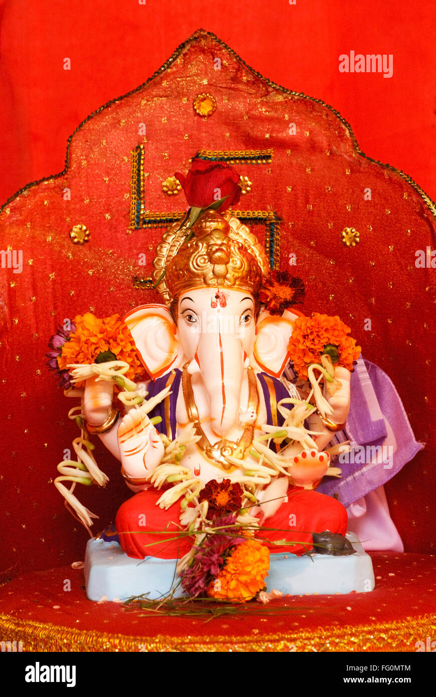 Richly decorated idol of lord Ganesh elephant headed god for Ganpati ...