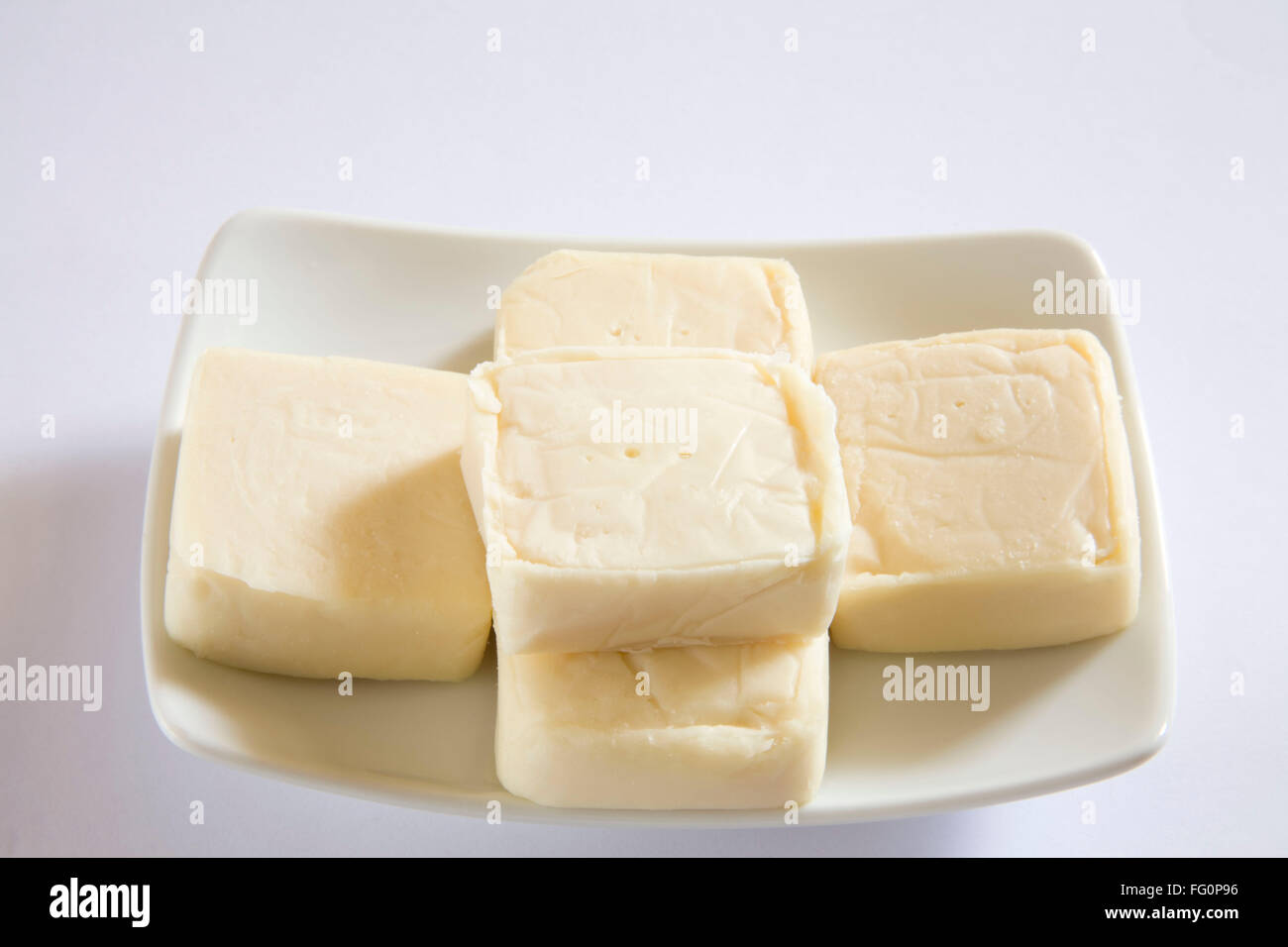 Pressed uncooked cheese hi-res stock photography and images - Alamy