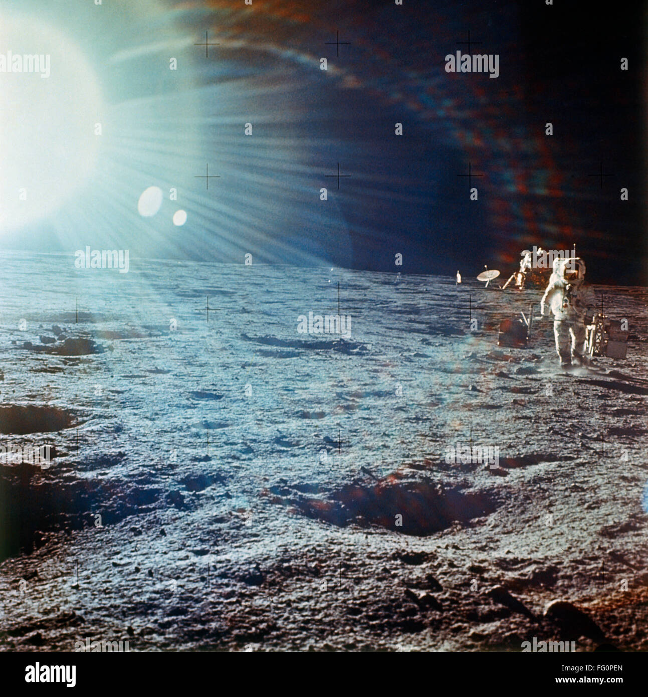 APOLLO 12, 1969. /nAstronaut Alan Bean carrying components of the ALSEP ...