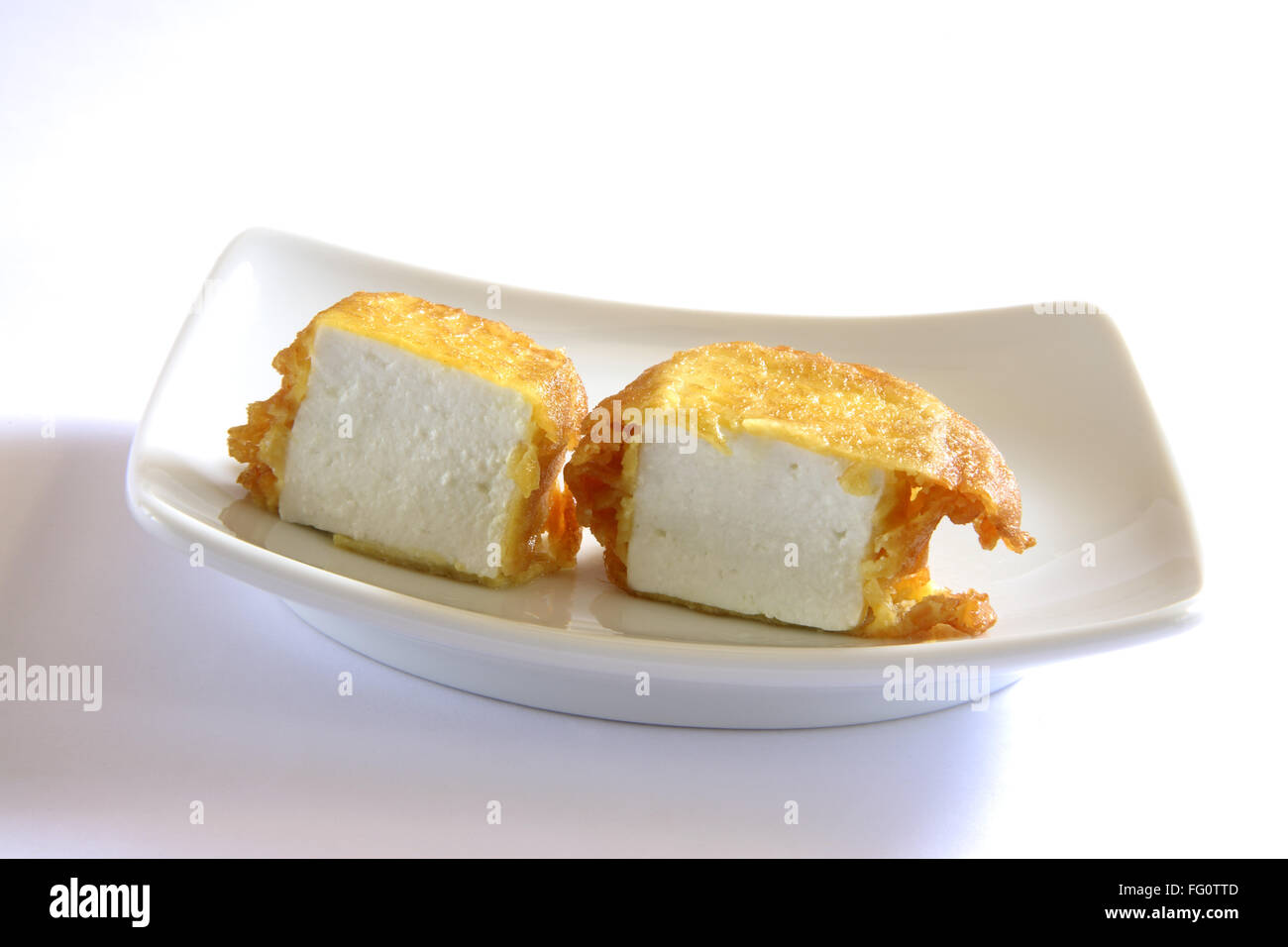 Indian cuisine , fast food starters Cheese Pakode puffs served in dish ...