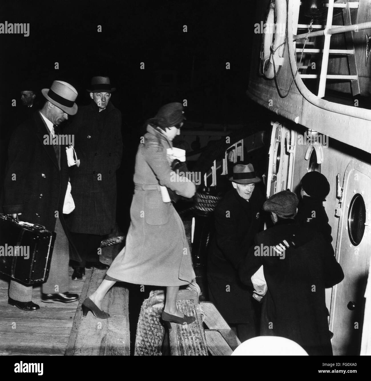 DEPORTATION, 1940. /nDeportees boarding a boat en route to Ellis Island ...