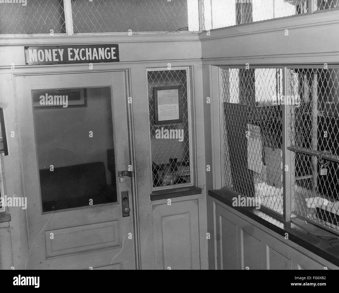 ELLIS ISLAND, c1940. /nMoney exchange room at Ellis Island. Photograph ...