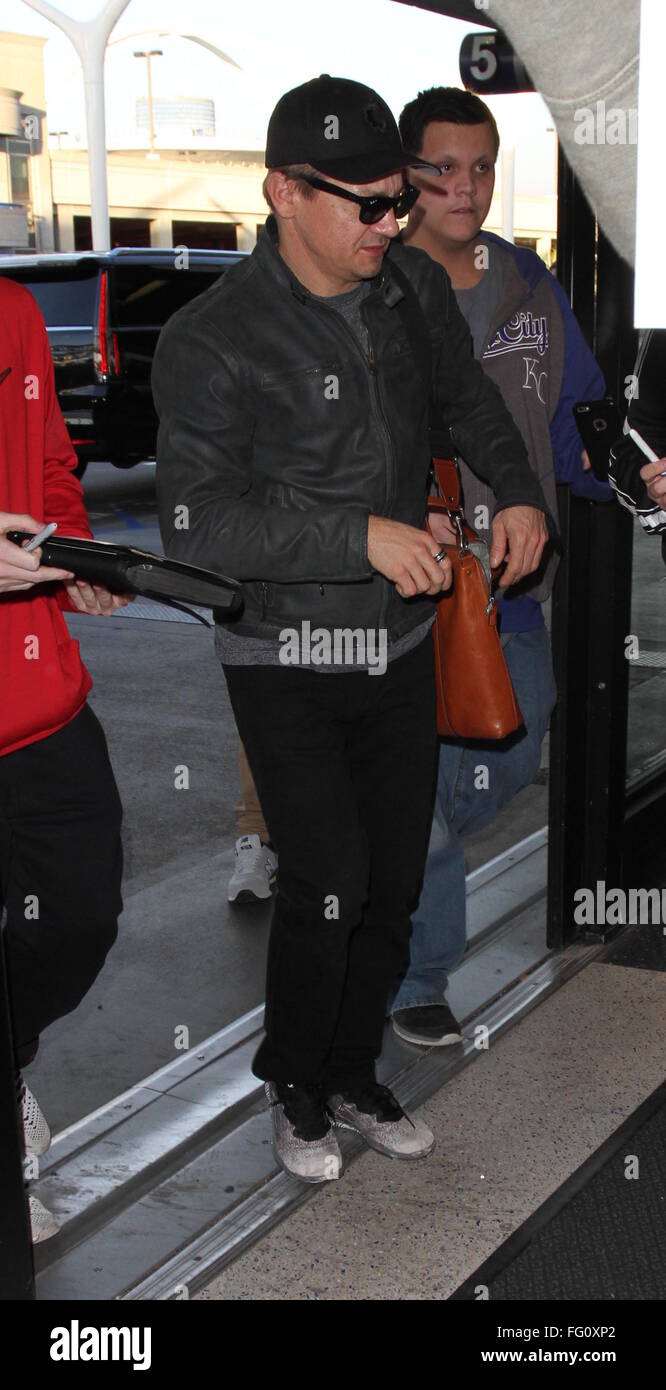 Jeremy Renner signs autographs for fans as he departs from Los Angeles ...