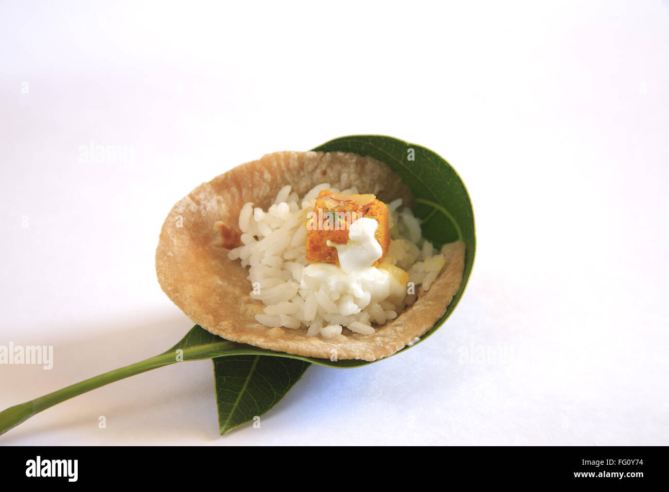 Concept , agragrass first morsel of food offered to gods Stock Photo ...