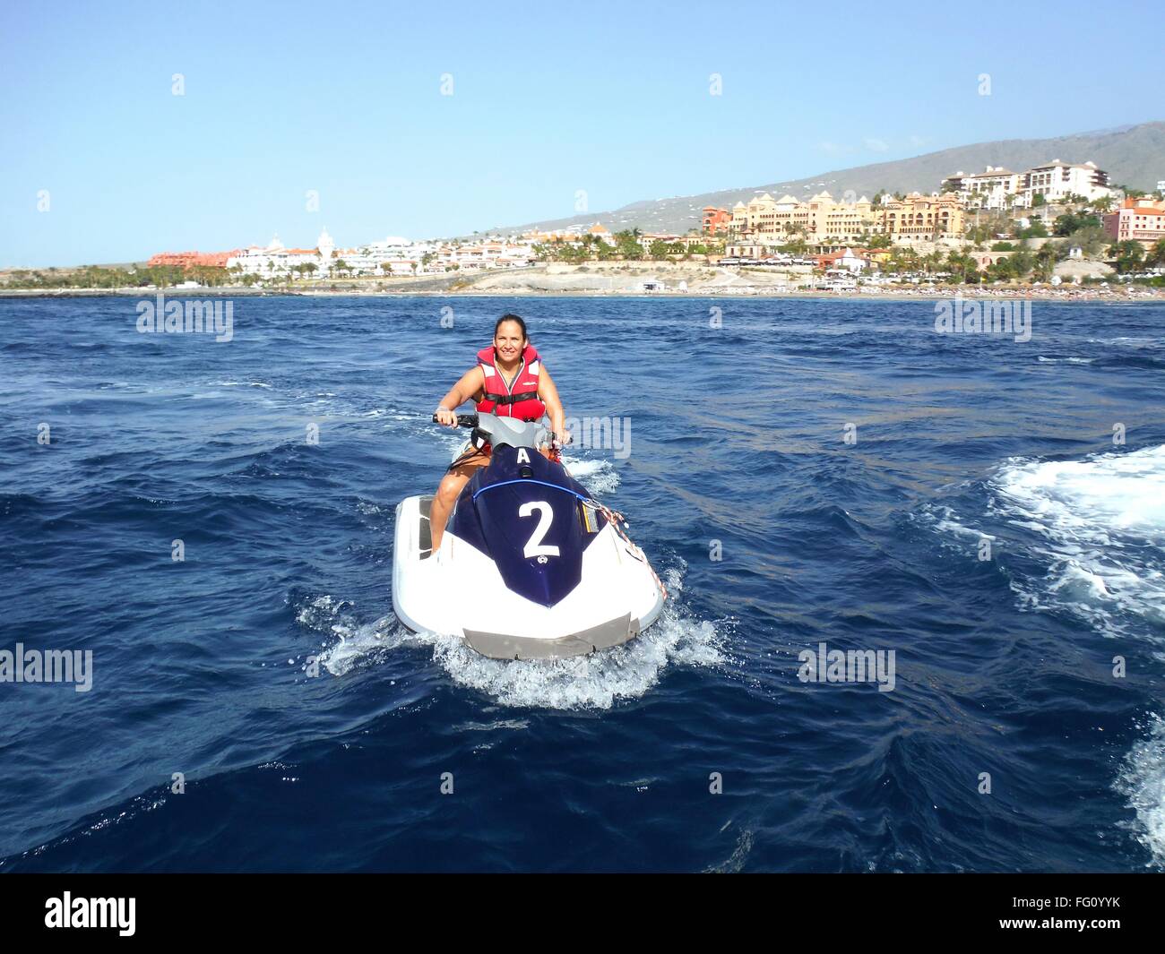 Woman on a jet ski hi-res stock photography and images - Alamy