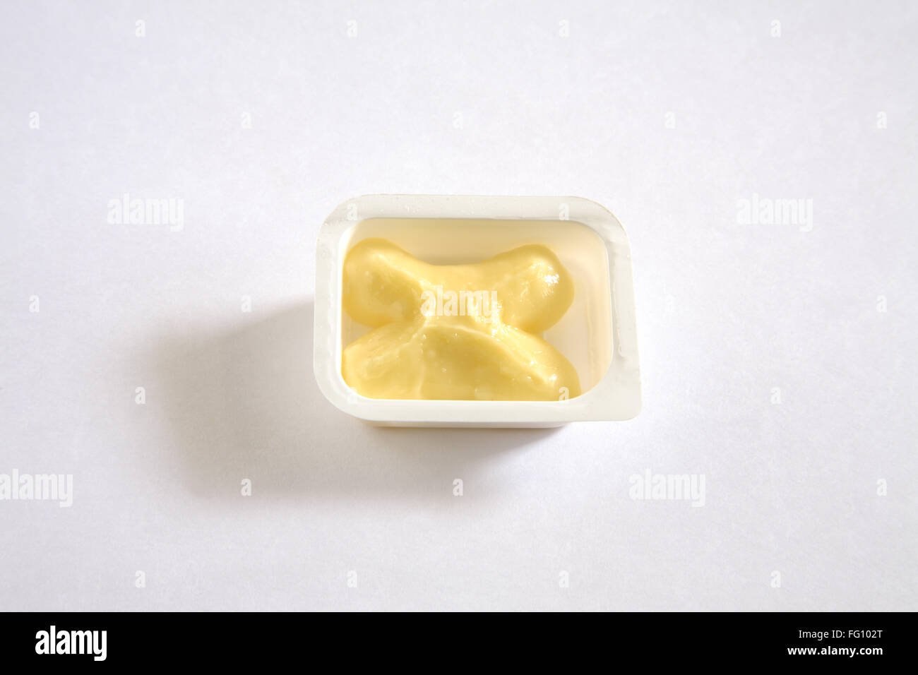 Dairy product , makhan maska butter in container on white background ...