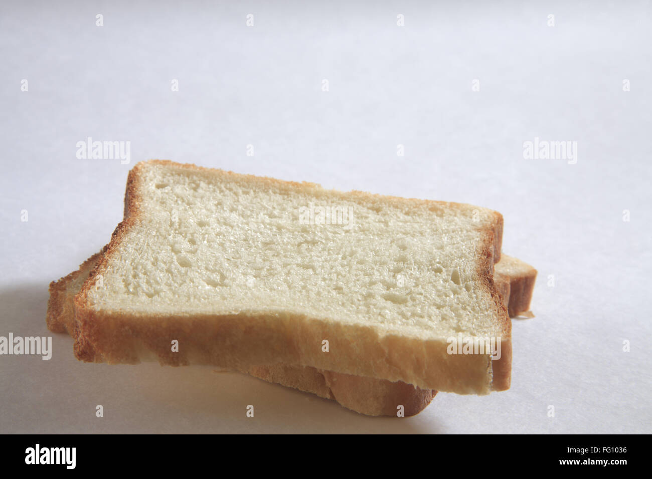 Slices of dabal roti bread dough made from flour yeast and milk on ...