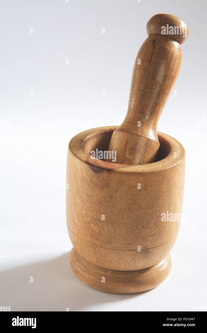 Concept , okhli or ukhli mortar wood manual grinder for pounding spice ...