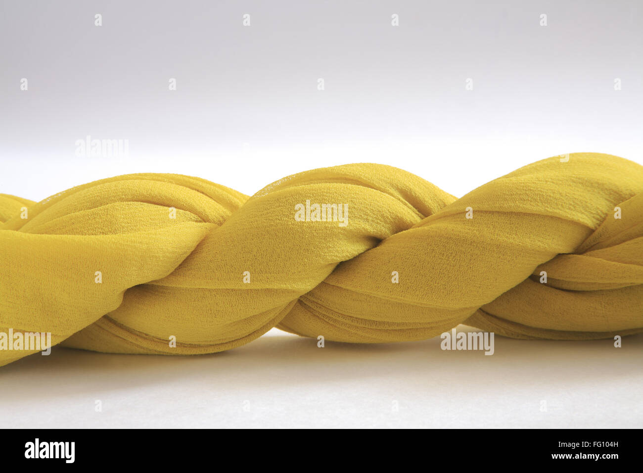 Concept , fabric turn twist on white background Stock Photo - Alamy