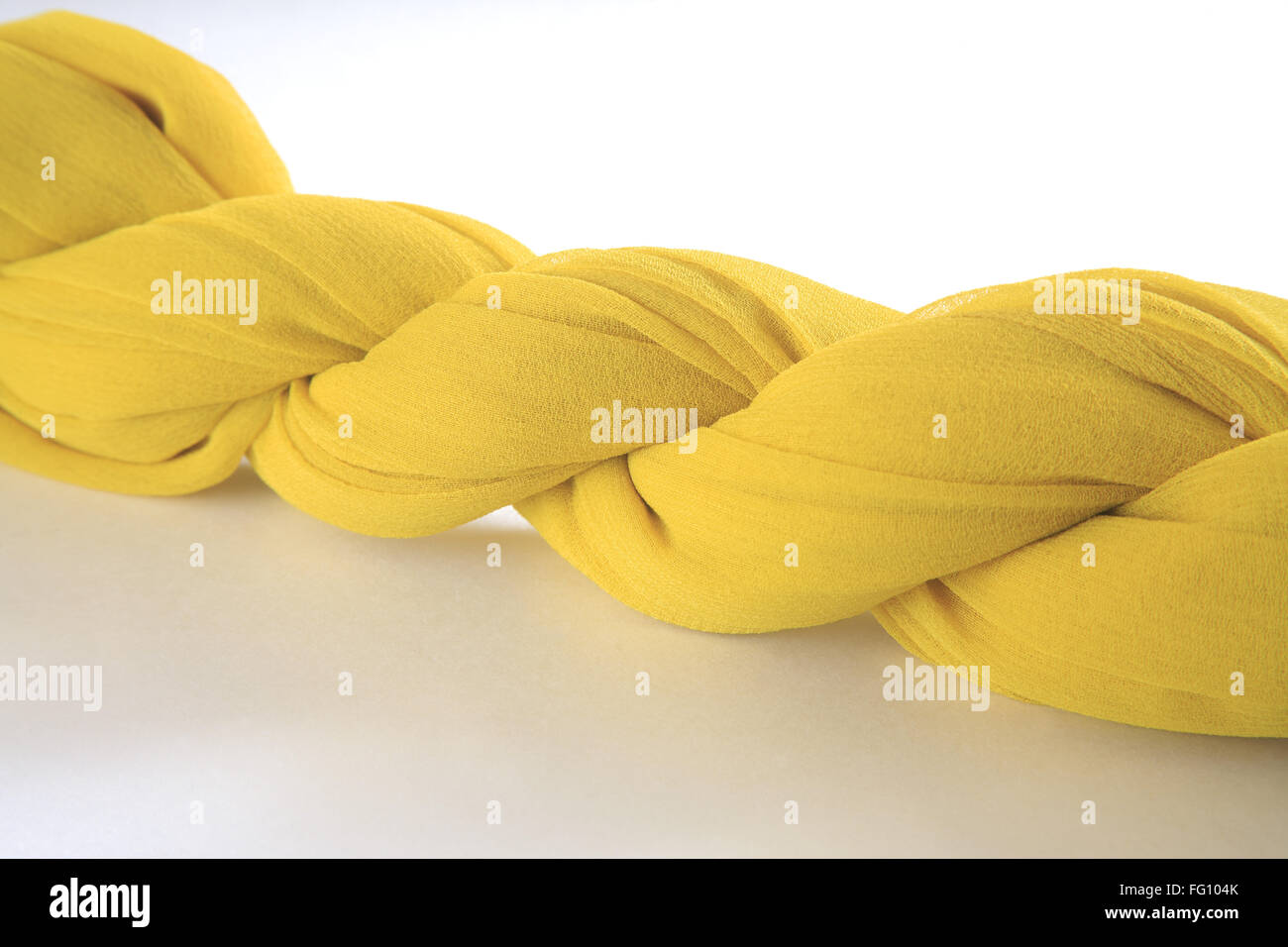 Concept , fabric turn twist on white background Stock Photo - Alamy