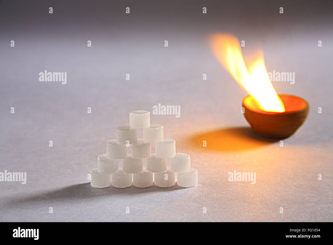 camphor crystals camphora officinerum burning on white background Stock ...