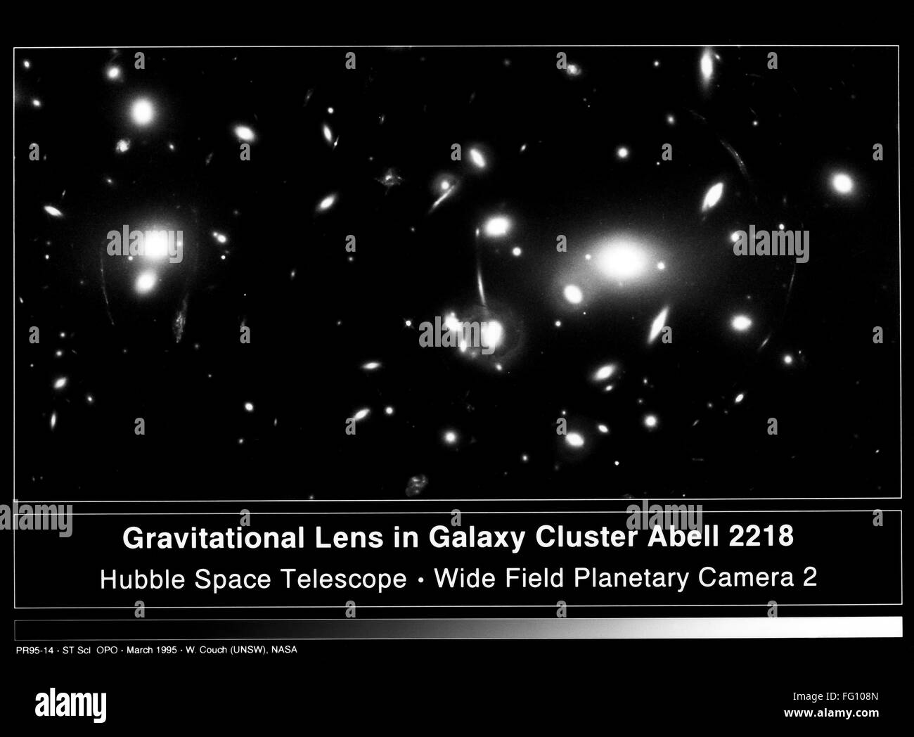 SPACE: GALAXY CLUSTER. /nA view of the galaxy cluster Abell 2218 in the constellation Draco ...