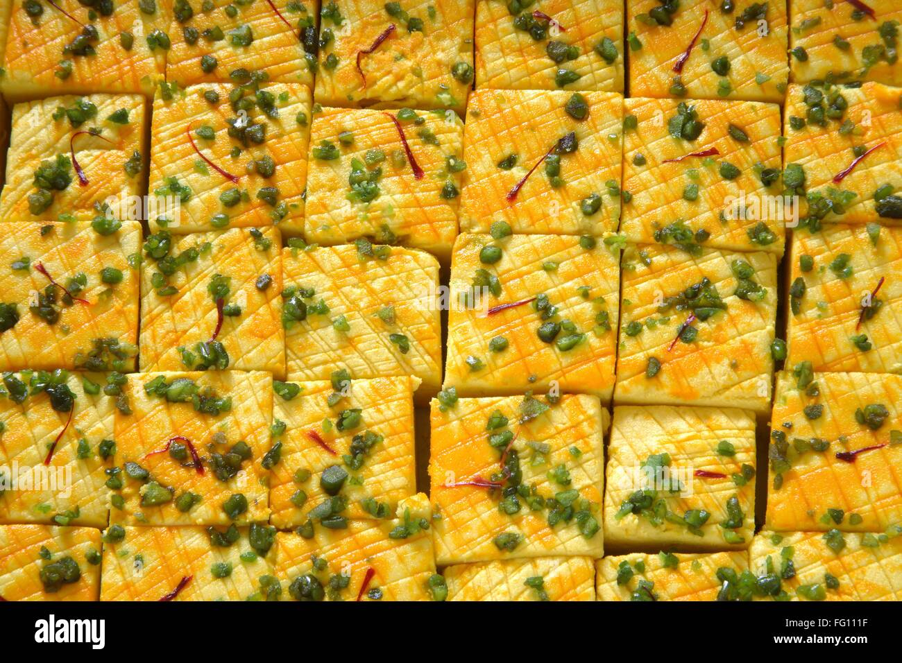 Indian sweet , sandesh bengali mithai garnish with pistachio and ...