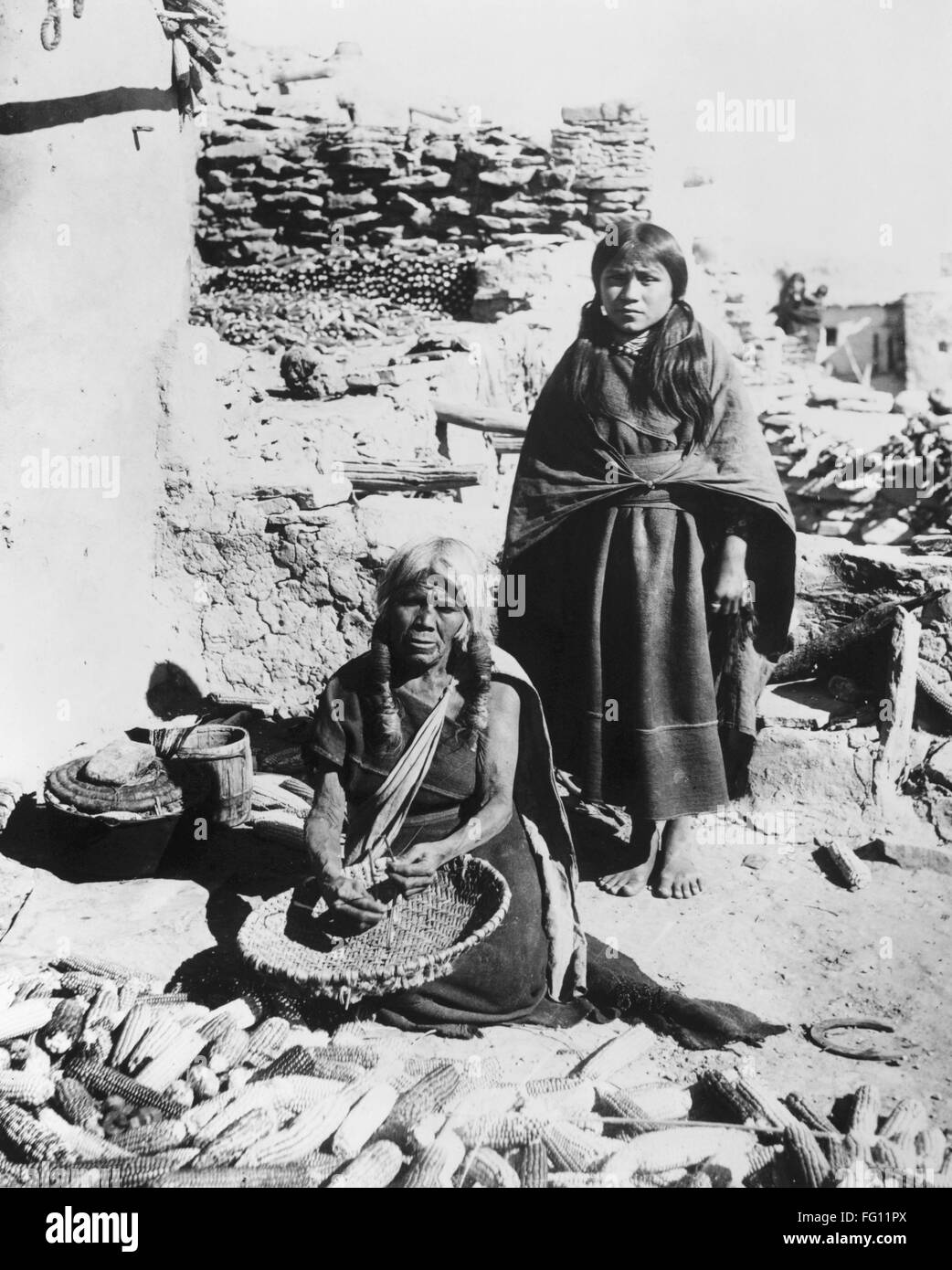 HOPI: BASKET WEAVERS, c1900. /nA Hopi (Moki) basket weaver and her ...