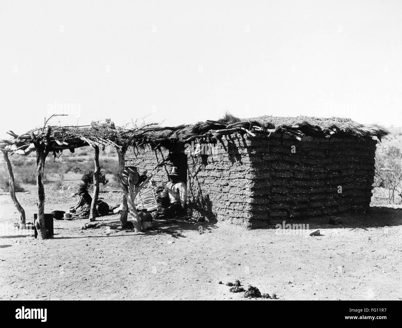 Native american indian man sitting Black and White Stock Photos ...