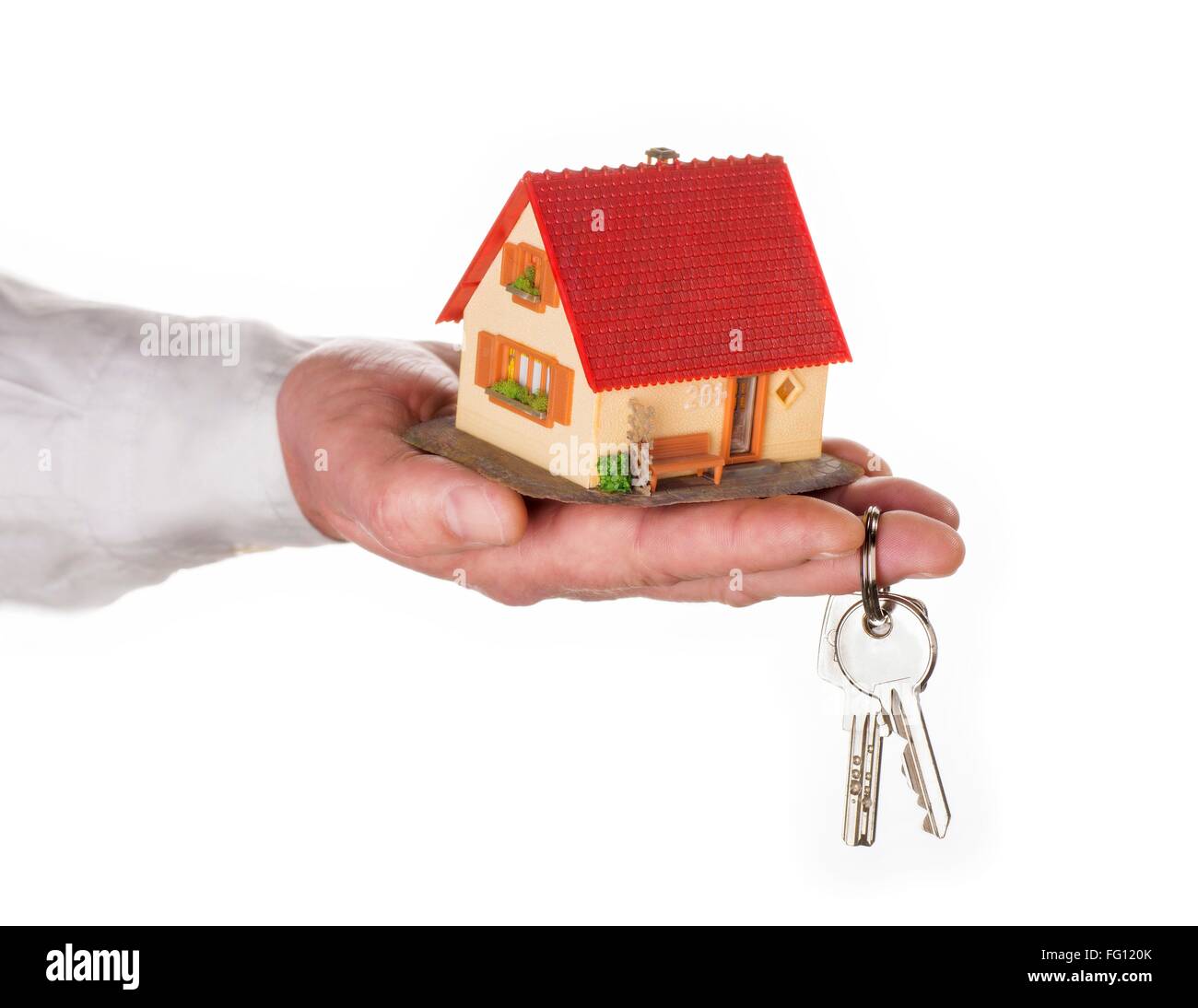 Hand with house and key Stock Photo - Alamy