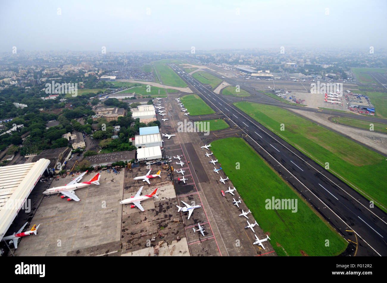 aerial view of runway and hangar of air india aeroplanes at chhatrapati ...
