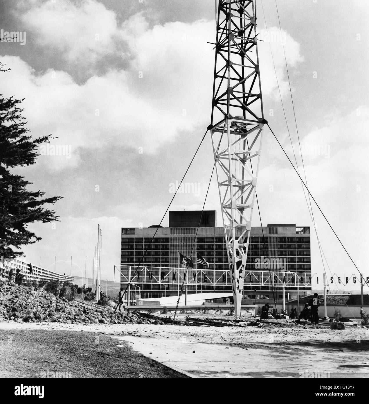 ISTANBUL: RADIO TOWER. /nA radio tower in front of a modern building in ...